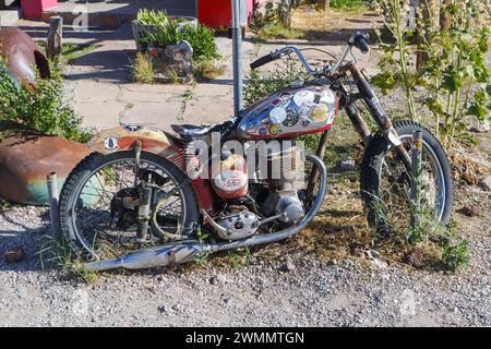 Old rusted abandoned motorcycle in desolate barn Stock Photo - Alamy