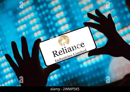 In this photo illustration, the Reliance Industries Limited logo is ...