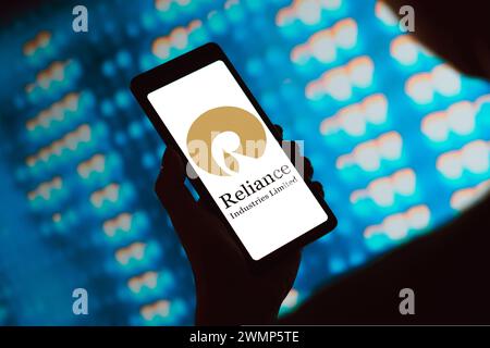 In this photo illustration, the Reliance Industries Limited logo is ...