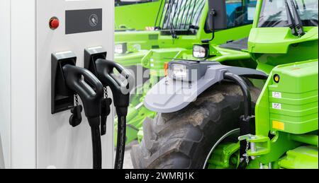 Electric construction bulldozer with charging station. Concept Stock ...