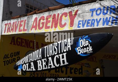 Signs for travel and tours in the Rinconada area in Puerto Escondido ...