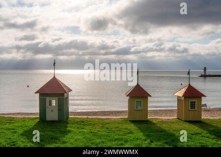 Colorful beach huts at Guldkroksbadet, Hjo, Sweden, next to lake ...