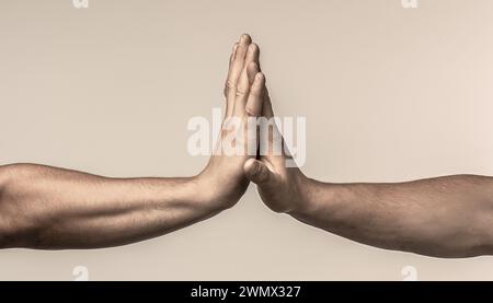 Two hands gestures. Giving high five. Two hands, male and man. High ...