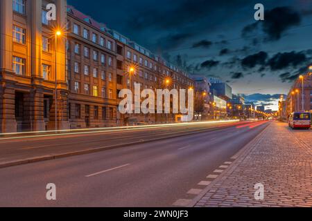 Prague, Czech Republic. 02-24-2021. Young woman checking her phone is ...