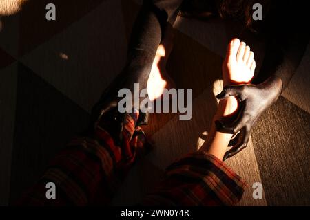 Scary monster under bed grabbing little girl by legs, closeup Stock ...