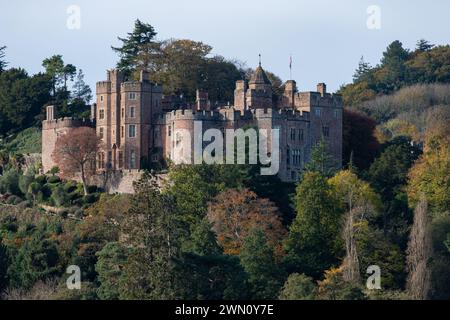 Landscape photo of the autumn colours at Dunster castle in Somerset ...