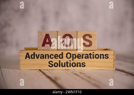 text Advanced Operations Solutions - AOS on wooden block Stock Photo ...