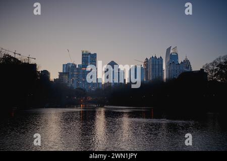 Panoramic view of Atlanta skyline during sunset shot from Piedmont Park ...