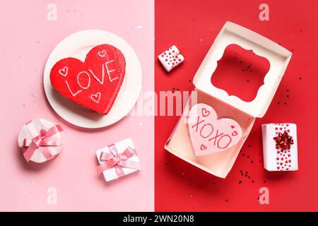 Heart-shaped bento cakes with gift boxes on color background. Valentine ...