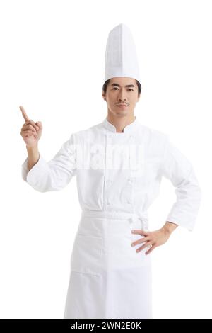 Confident chef pointing Stock Photo - Alamy