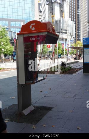 Telstra public red telephone booth in front of York Post Office stone ...
