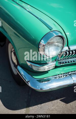 Classic turquoise car with shiny headlight and chrome details Stock ...