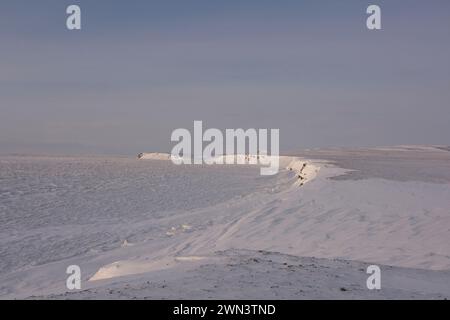 Frozen coast line along northern coastline near point of Point Hope ...