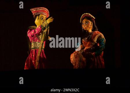 Puppeteers perform with puppets during the Tripura International Puppet ...