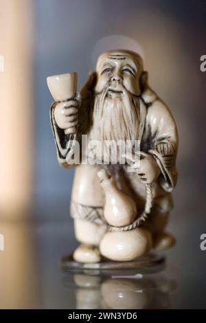 Carved ivory miniature from East Asia Stock Photo - Alamy