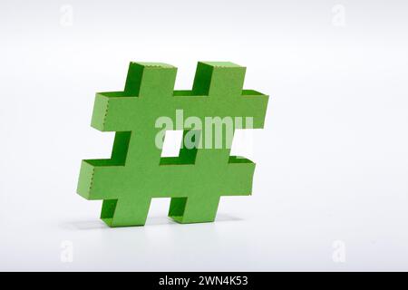 Hashtag symbol on white background. Green chrome 3D rendered sign with ...