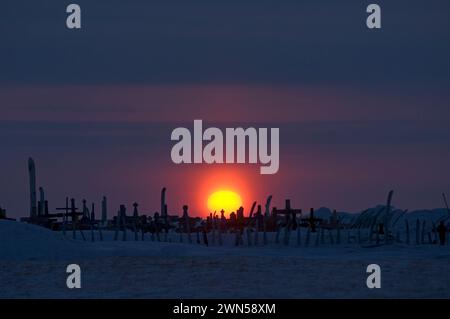 Sunset over graveyard site marked by whale rib bones outside the oldest ...