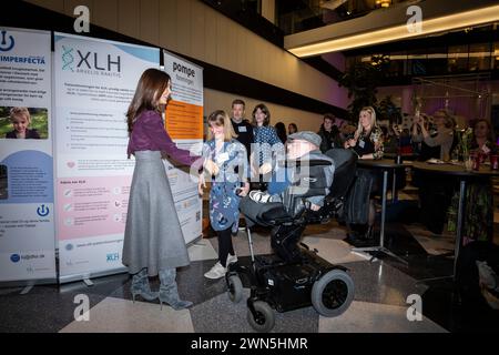 Danish Queen Mary speaks to Karsten Jensen from the Danish Association ...