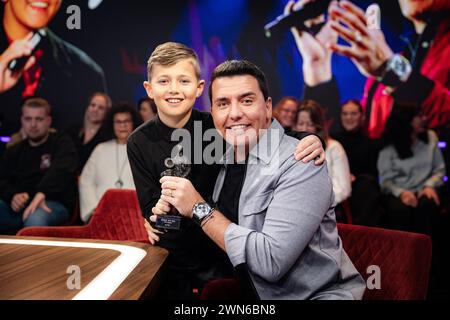 AMSTERDAM - Jan Smit receives an Edison Pop Oeuvre Prize from his son ...