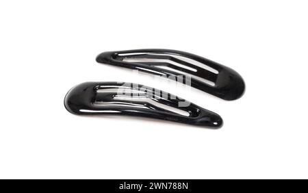 Black hair clips on isolated white background Stock Photo - Alamy