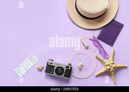 Composition with paper figure 8, ticket and beach accessories on color ...