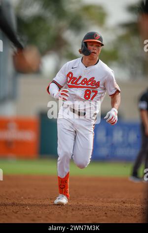 Baltimore Orioles' Jackson Holliday takes a lead from first base during ...