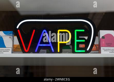 Electric colourful sign for VAPE products England, UK Stock Photo - Alamy