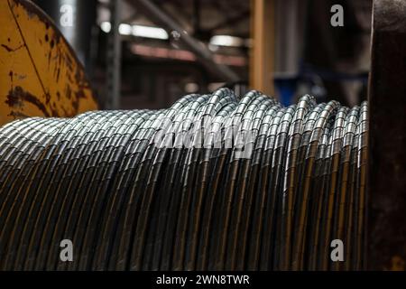 Close up Wooden Coils Of Electric Cable in factory . High and low ...