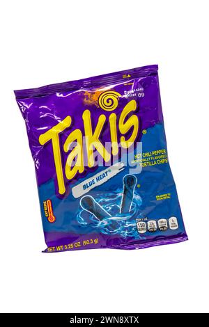 A packet of Takis, rolled tortilla chips. Blue heat hot chili pepper ...