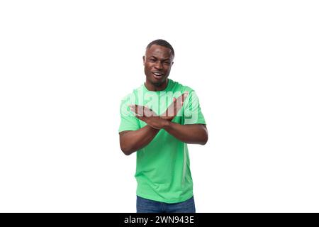 young confident american male advertiser dressed in green mockup t ...