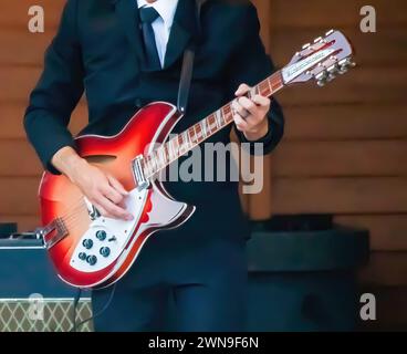 Rickenbacker bass guitar being played by a musician in Lindstrom ...
