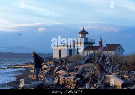 Hiker in Discovery Park West Point Lighthouse Puget Sound Salish sea ...