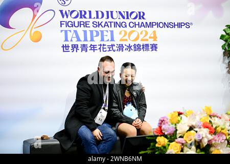 Lulu LIN (CAN), at Kiss & Cry during Junior Women Free Skating, at the ...