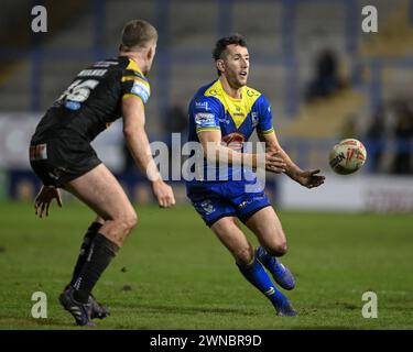 Stefan Ratchford #1 of Warrington Wolves makes a break in, on 4/14/2022 ...
