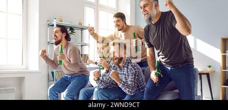 Soccer fans watch the game on their phones while Canada plays Qatar in ...