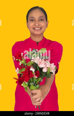 Young indian girl wearing casual clothes with hand on chin thinking ...