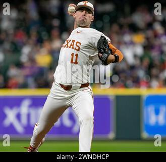 Texas pitcher Tanner Witt throws against Nevada during an NCAA baseball ...