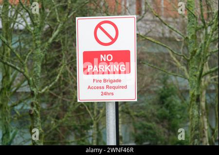 Private parking sign fire brigade access required Stock Photo - Alamy