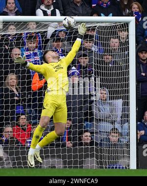 Rangers goalkeeper Jack Butland saves from Dundee United's Sam Dalby ...