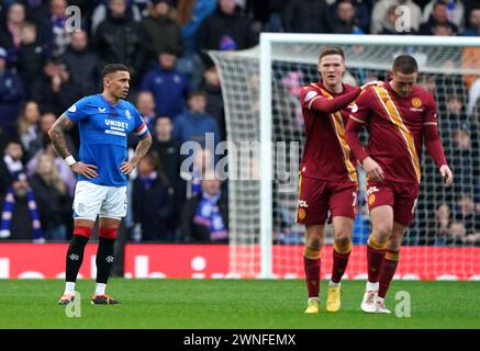 Rangers' James Tavernier (left) reacts to a decision by referee Steven ...