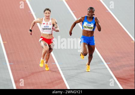 Poland's Ewa Swoboda, silver and Saint Lucia's Julien Alfred, gold in the Women's 60m Final ...