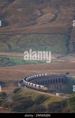 Freightliner class 66 locomotive 66526 running off Ribblehead viaduct ...