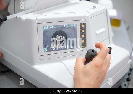 ophthalmology, advanced ocular diagnostic technology in use at an eye ...