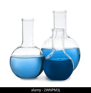 Boiling flask with blue liquid isolated on white. Laboratory glassware ...
