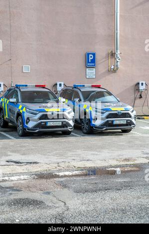 Charging an EV Police traffic car / electric vehicle designed for use ...