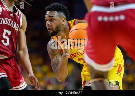 Maryland forward Donta Scott drives against Rutgers during the first ...
