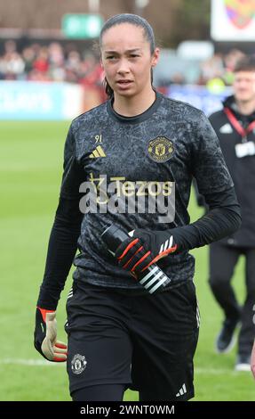 Phallon Tullis-Joyce of Manchester United warms up ahead of the ...