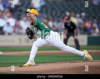 Athletics' J.P. Sears pitches during the fourth inning of a baseball ...