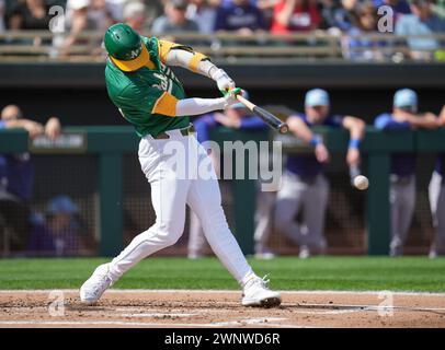 Athletics' Brent Rooker hits a single during the sixth inning of a ...