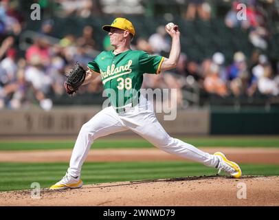 Oakland Athletics starting pitcher JP Sears throws during the first ...